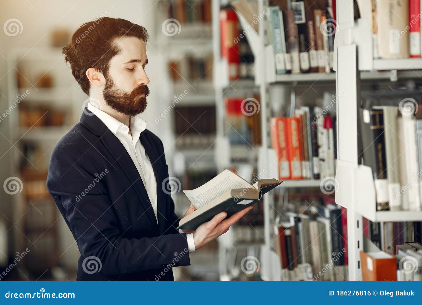 Handsome Guy Study at the Library Stock Photo - Image of handsome ...