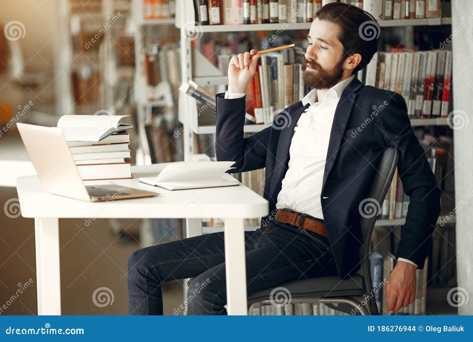 Handsome Guy Study at the Library Stock Photo - Image of college ...