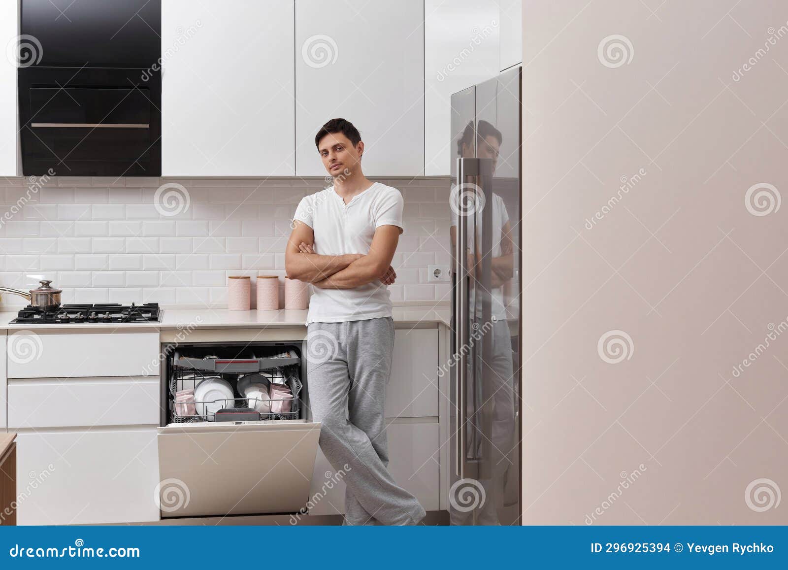 Handsome Husband Man Using Dishwasher in White Modern Kitchen Stock ...