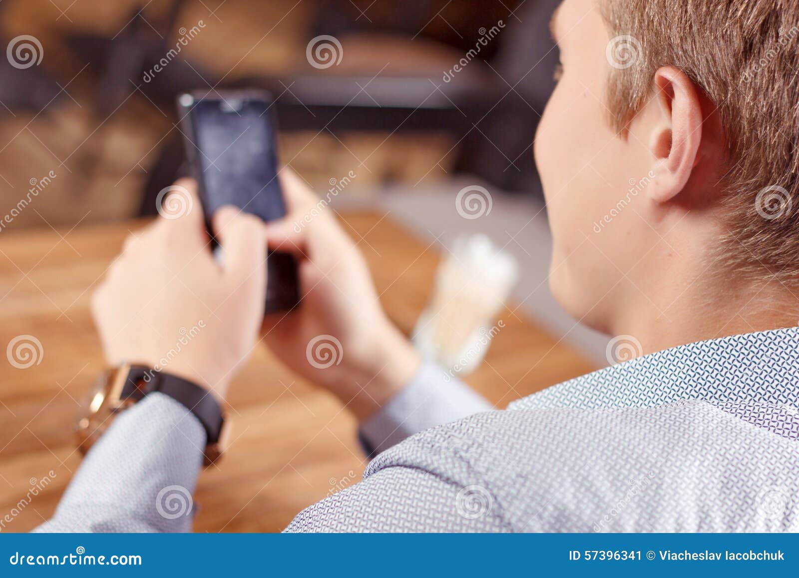 Handsome Guy Using Mobile Phone in Cafe Stock Image - Image of smile ...