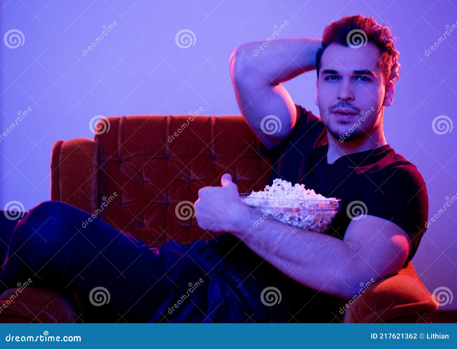 Handsome Guy Watching Movie Stock Photo - Image of male, communication ...