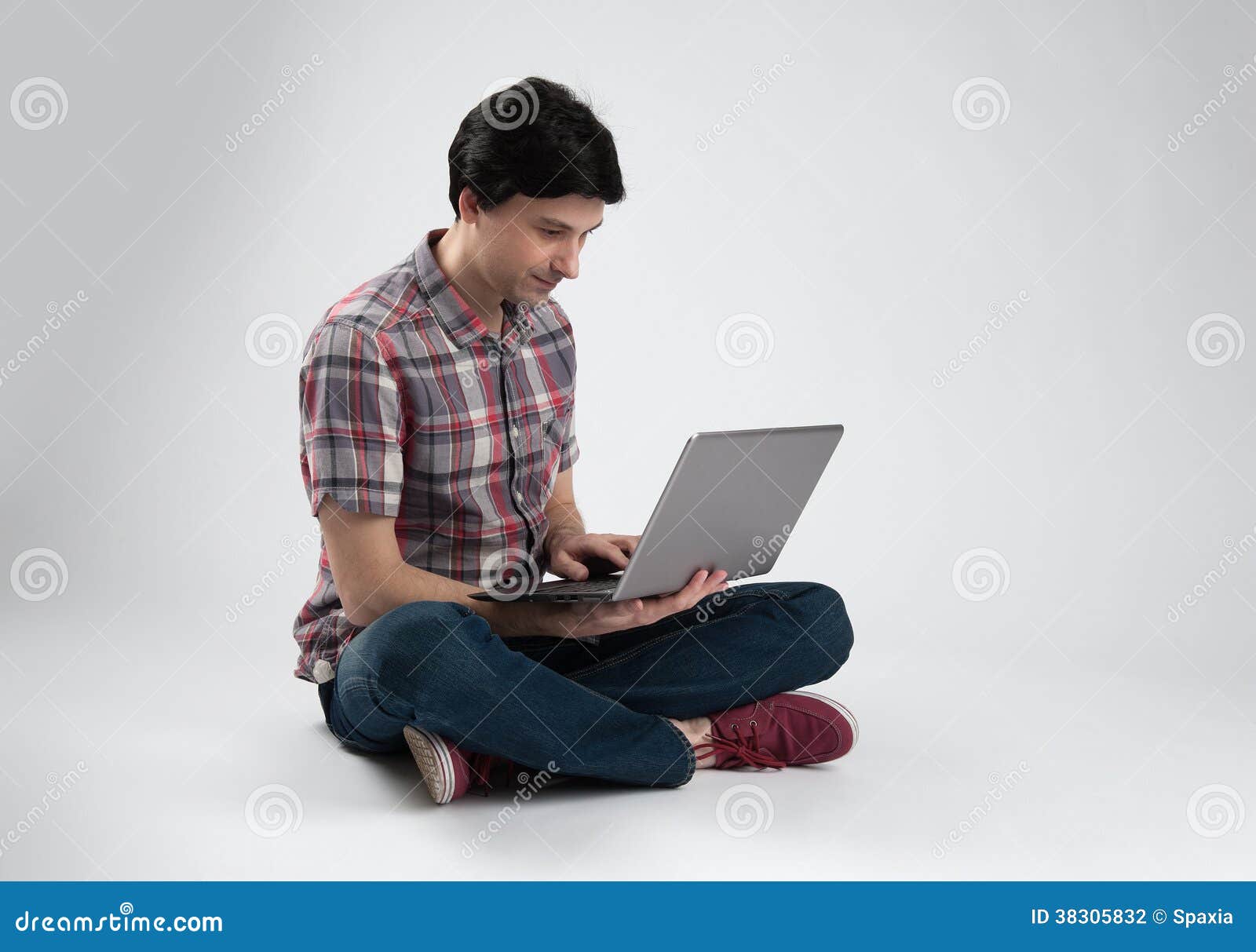 Handsome Guy Working on a Laptop Stock Photo - Image of person, student ...