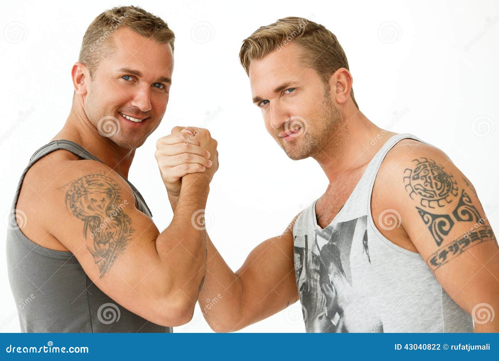 Handsome guys at home stock photo. Image of guys, handshake - 43040822