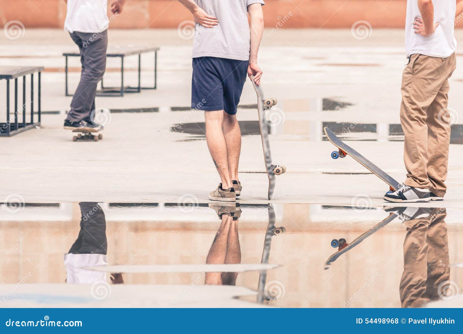 Handsome Guys with Skateboard at Freestyle Park Outdoors Stock Photo ...