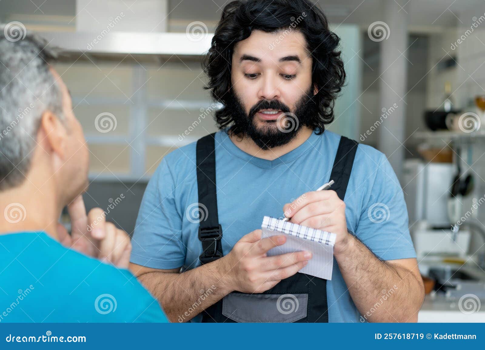 Handsome Handyman Notes Customer Request Stock Image - Image of ...