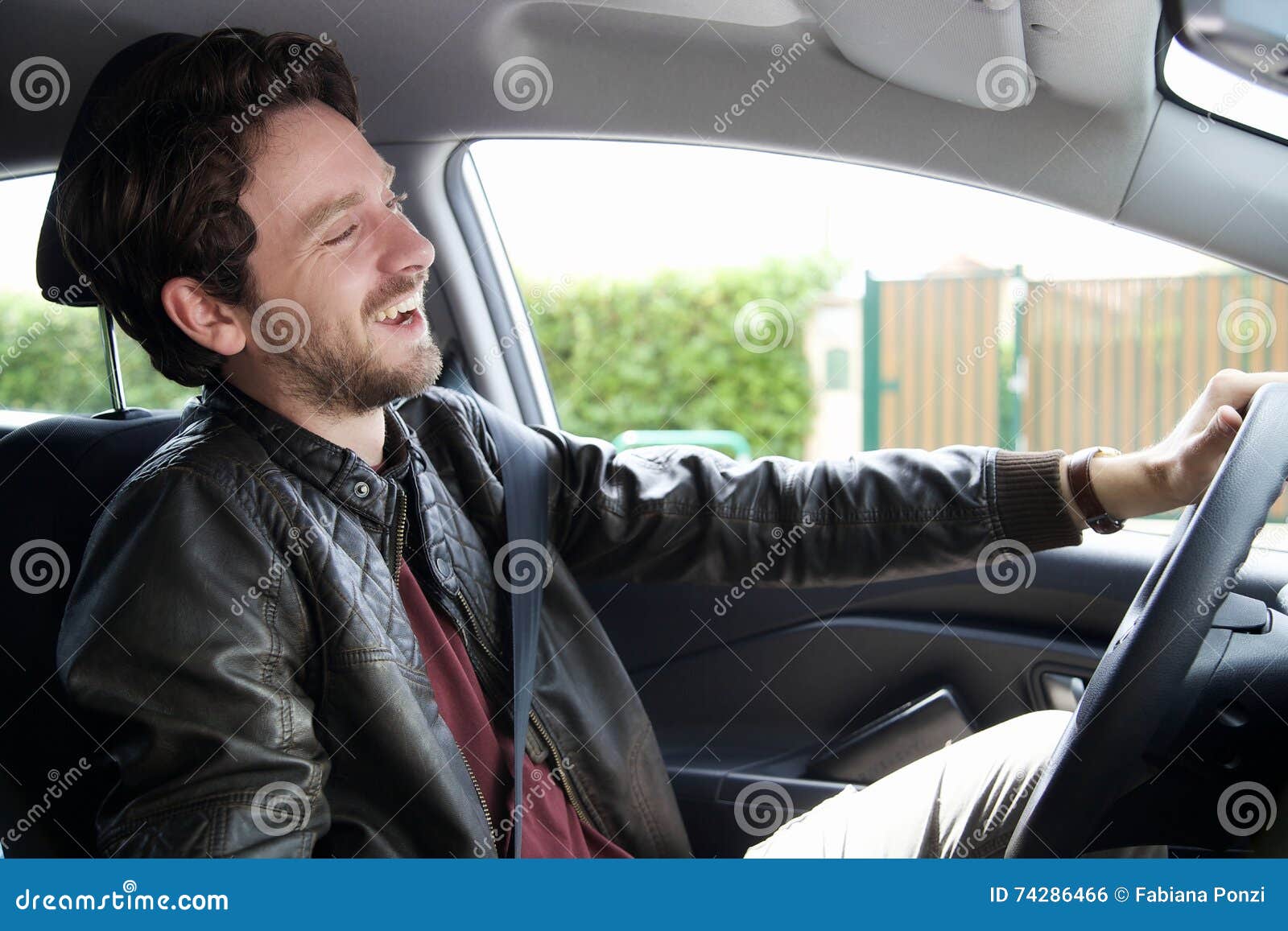Handsome Happy Man Driving Car Laughing Stock Photo - Image of ...