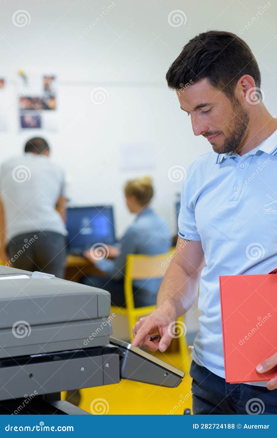 Handsome and Happy Man Using Copy Machine at Work Stock Photo - Image ...