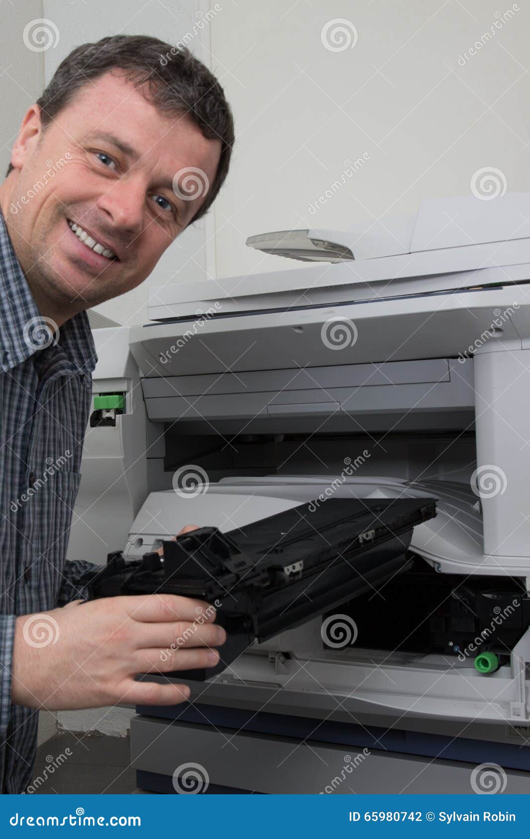 Handsome and Happy Man Using a Copy Machine Stock Photo - Image of ...