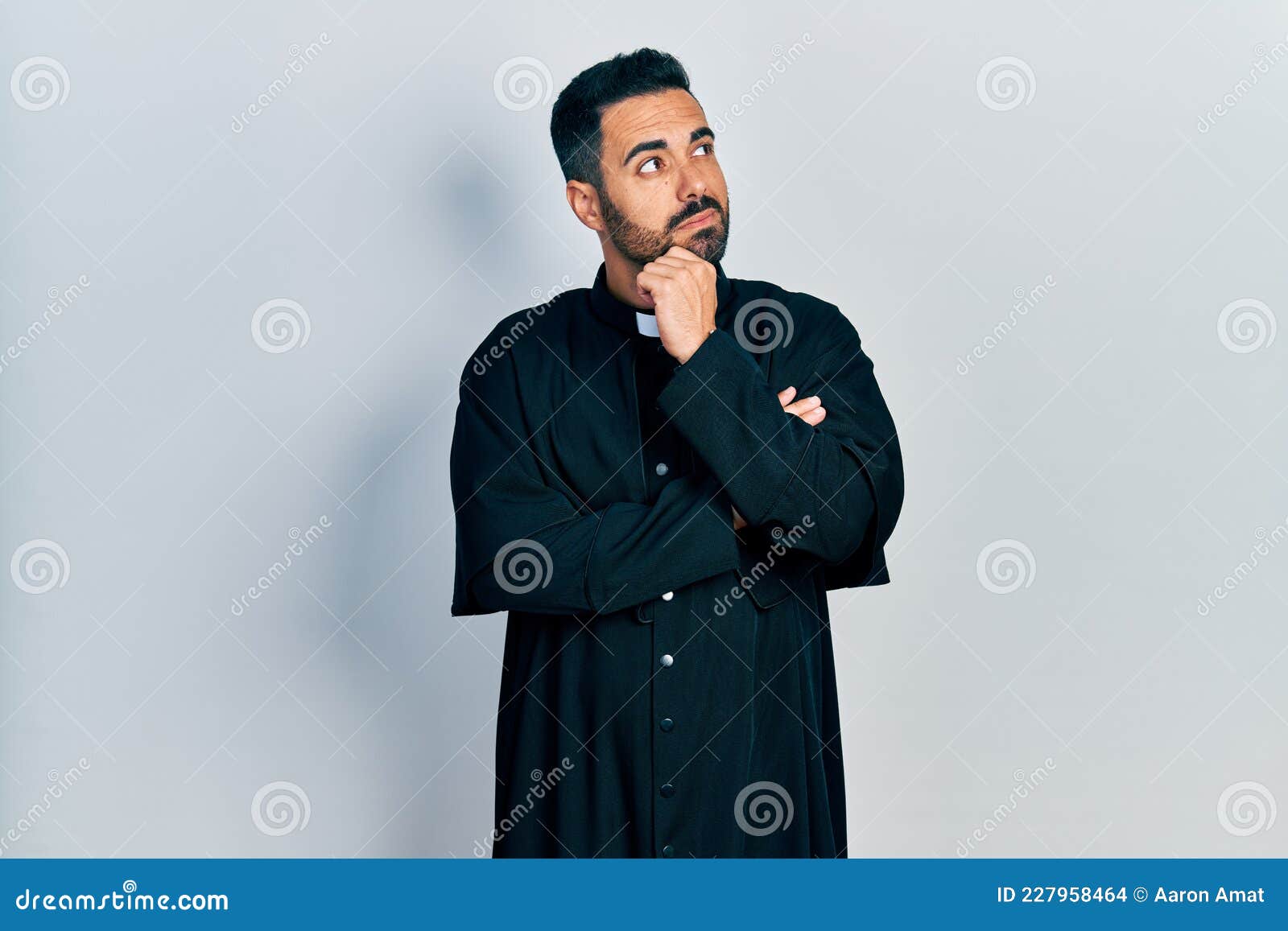 Handsome Hispanic Man with Beard Wearing Catholic Priest Robe with Hand ...
