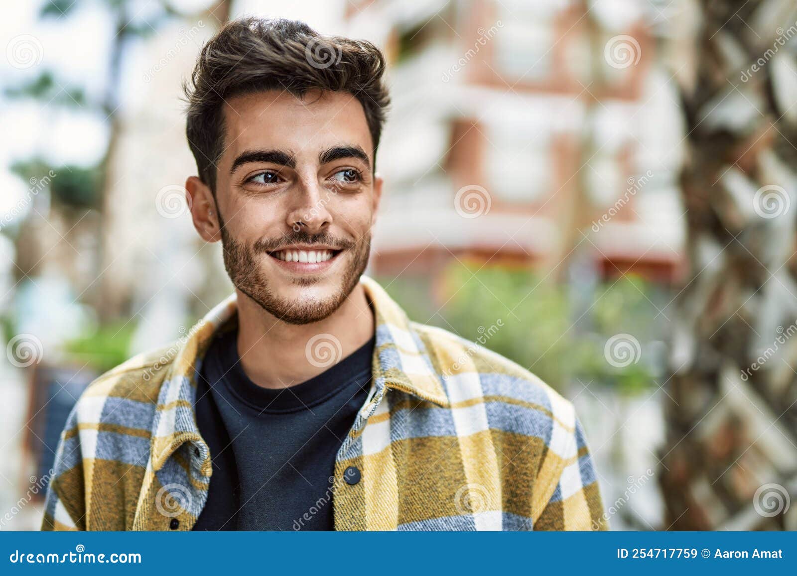 Handsome Hispanic Man Smiling Happy and Confident at the City Stock ...