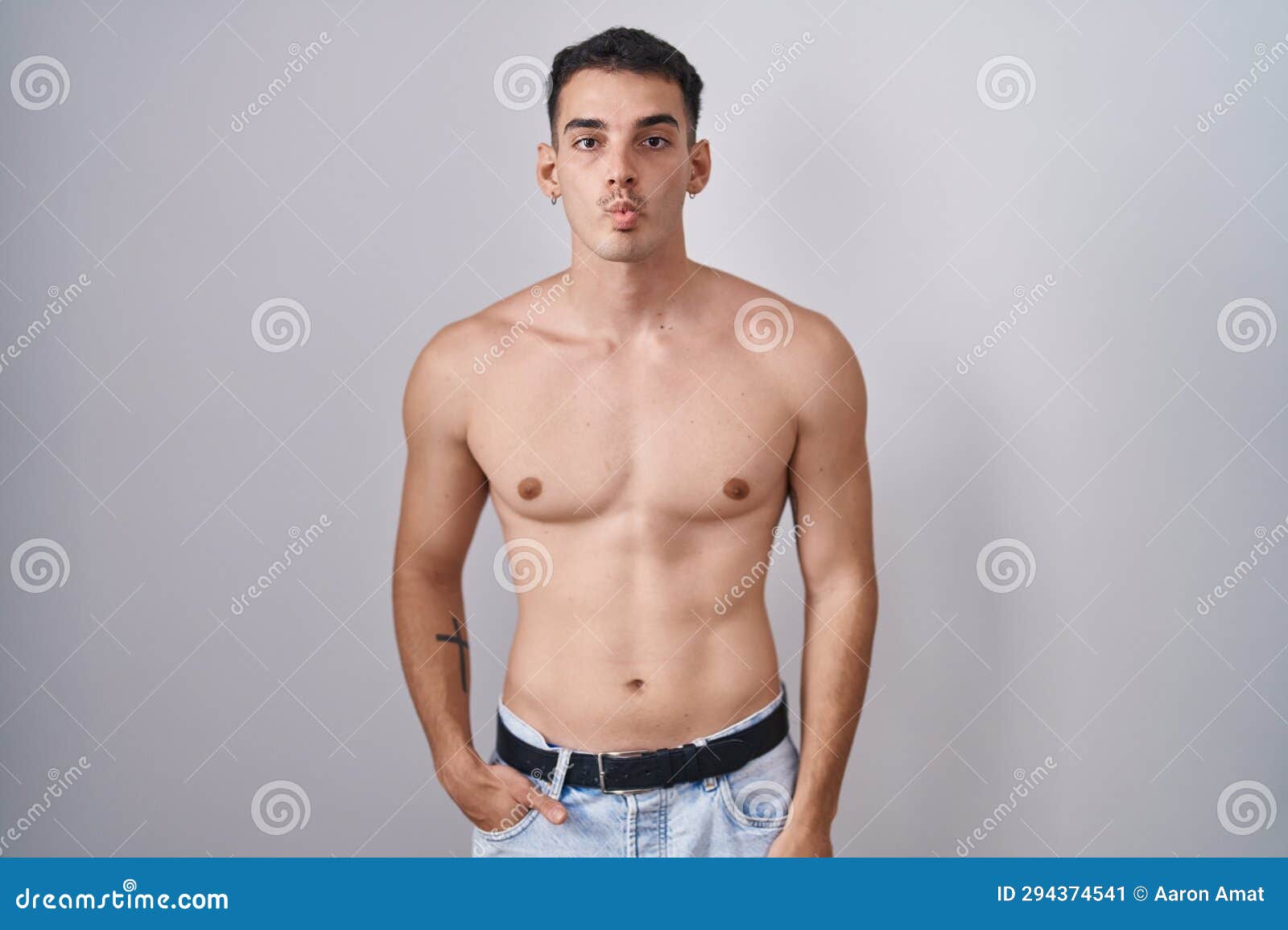 Handsome Hispanic Man Standing Shirtless Making Fish Face with Lips ...