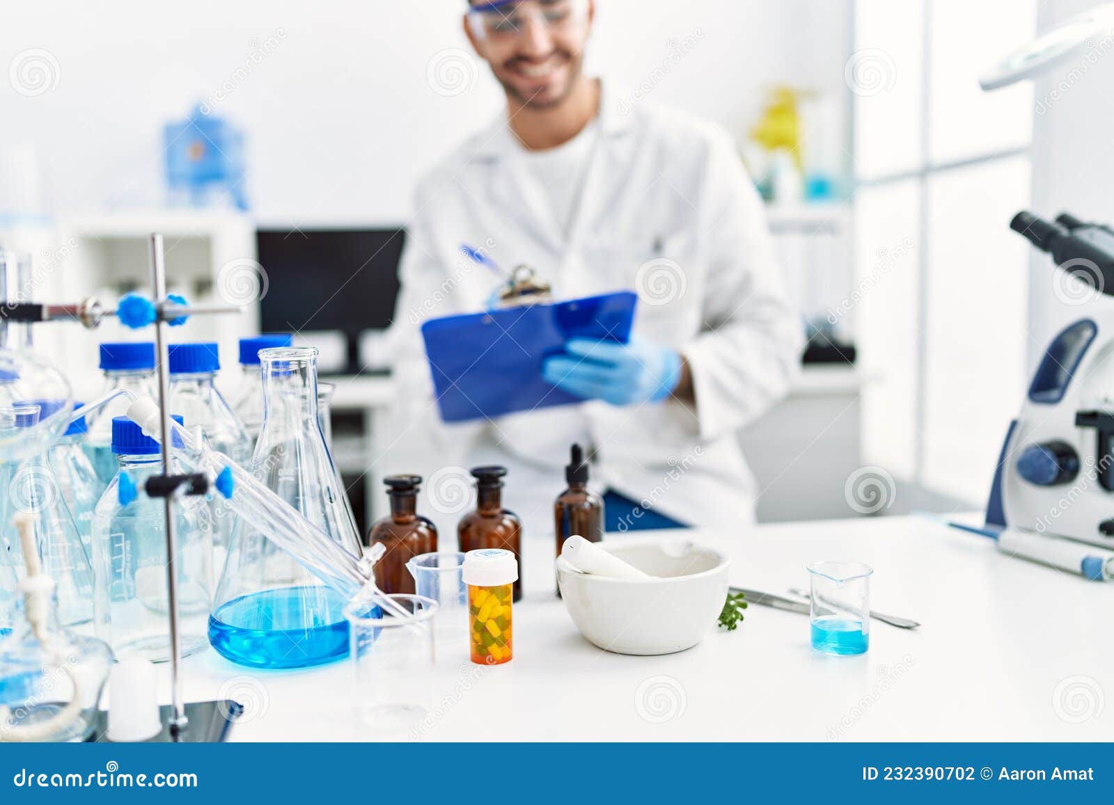 Handsome Hispanic Man Working As Scientific at Laboratory Stock Photo ...
