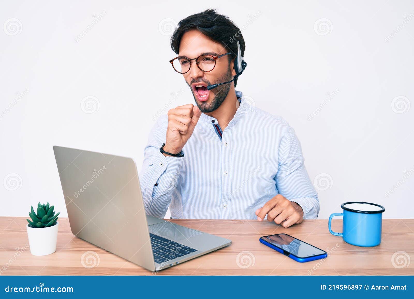 Handsome Hispanic Man Working at the Office Wearing Operator Headset ...