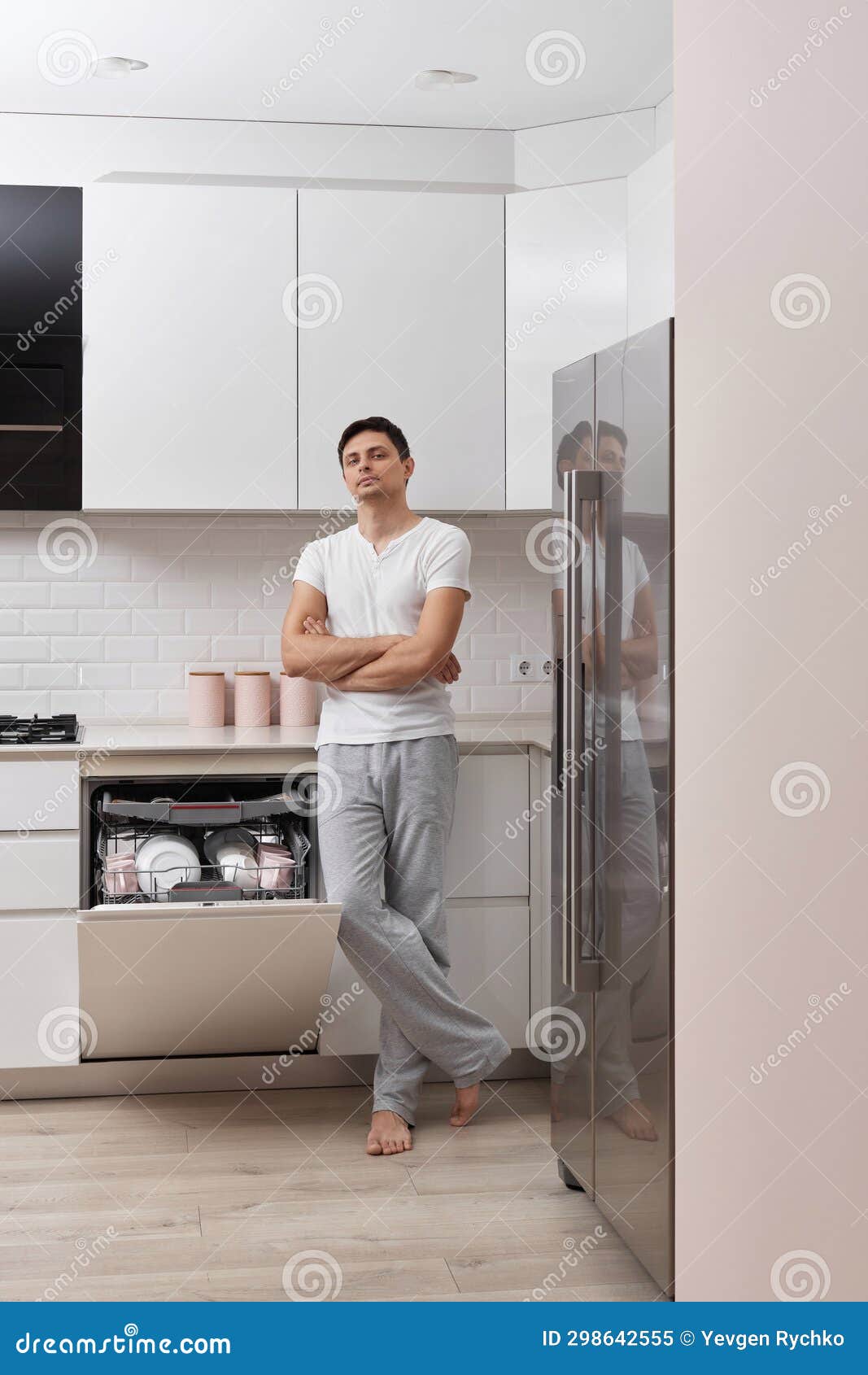 Handsome Husband Man Using Dishwasher in White Modern Kitchen Stock ...