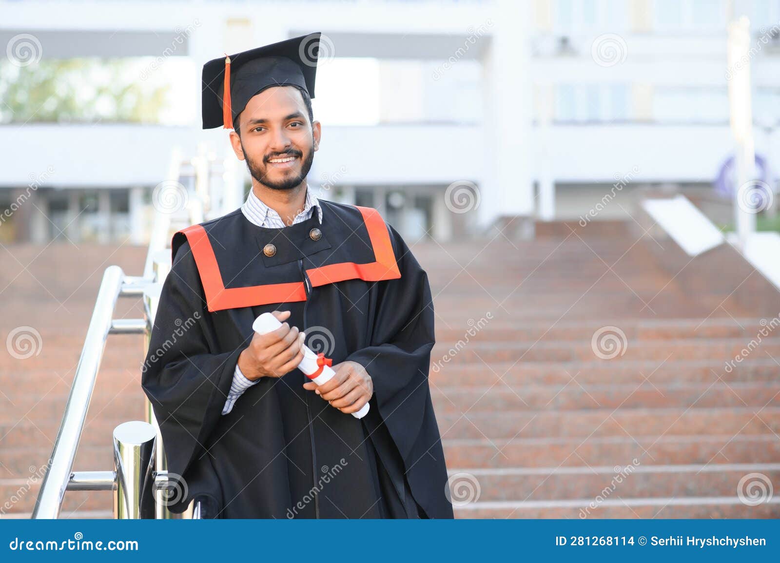 Handsome Indian Graduate in Graduation Glow with Diploma. Stock Photo ...
