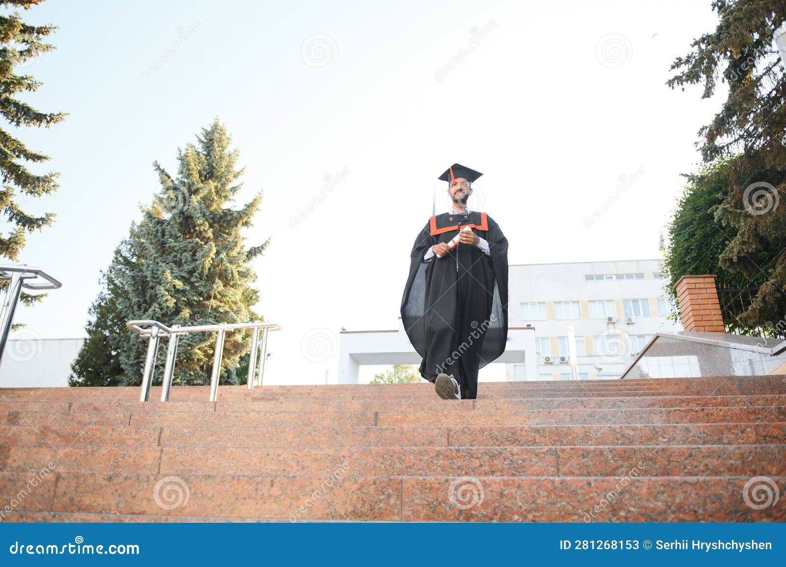 Handsome Indian Graduate in Graduation Glow with Diploma. Stock Image ...