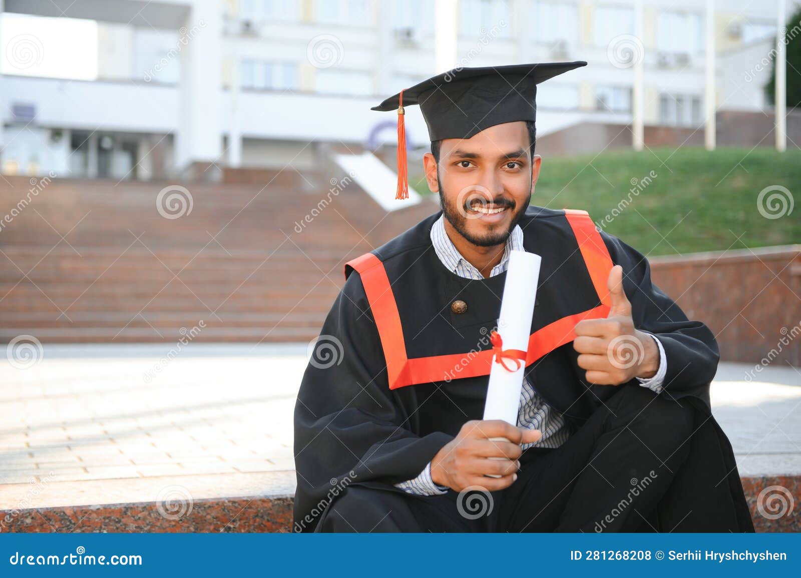 Handsome Indian Graduate in Graduation Glow with Diploma. Stock Photo ...