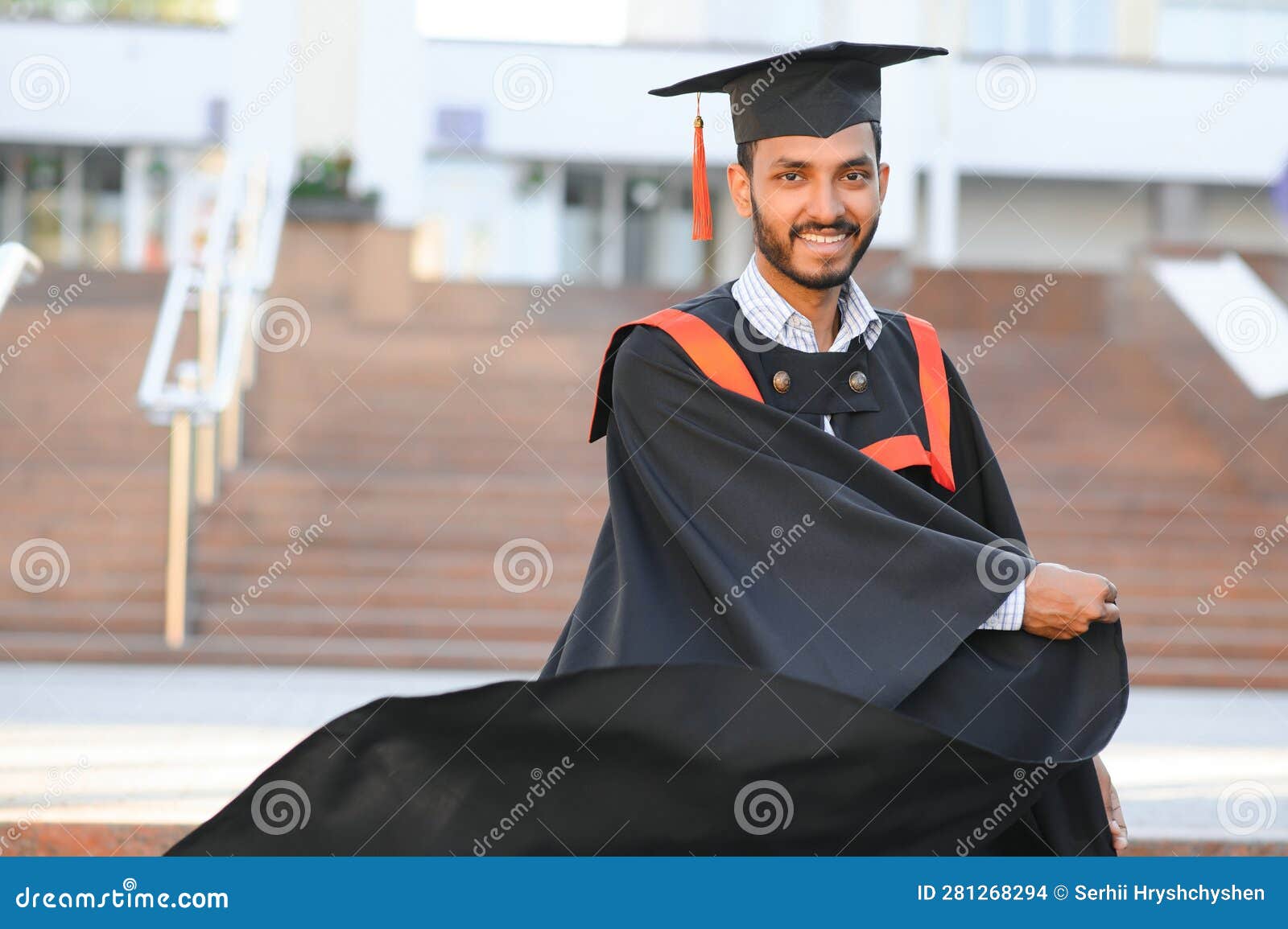 Handsome Indian Graduate in Graduation Glow with Diploma. Stock Photo ...