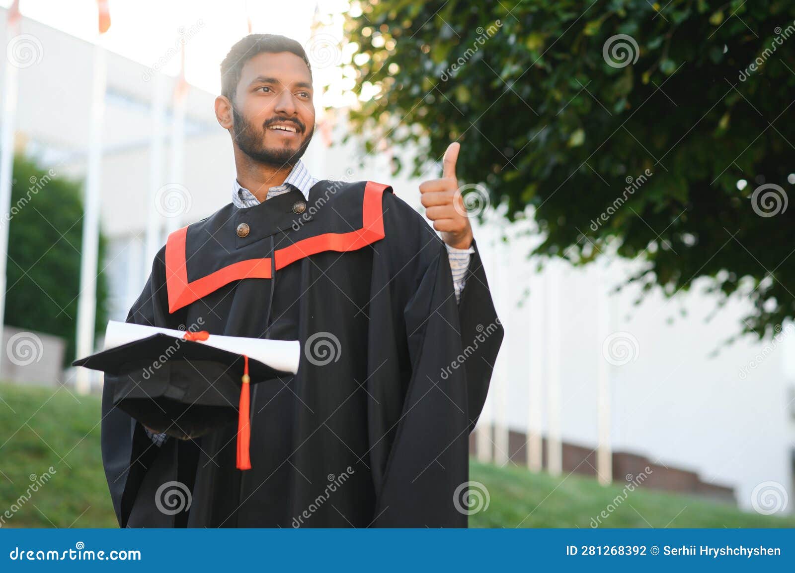 Handsome Indian Graduate in Graduation Glow with Diploma. Stock Photo ...