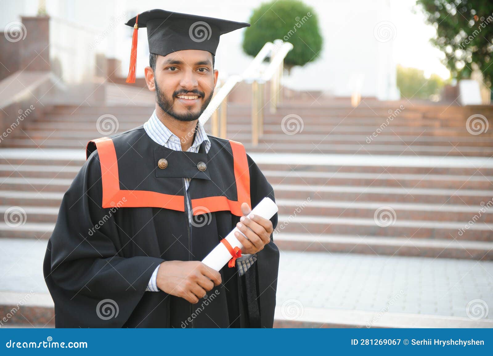 Handsome Indian Graduate in Graduation Glow with Diploma. Stock Image ...