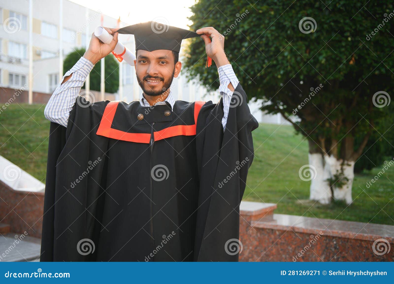 Handsome Indian Graduate in Graduation Glow with Diploma. Stock Image ...