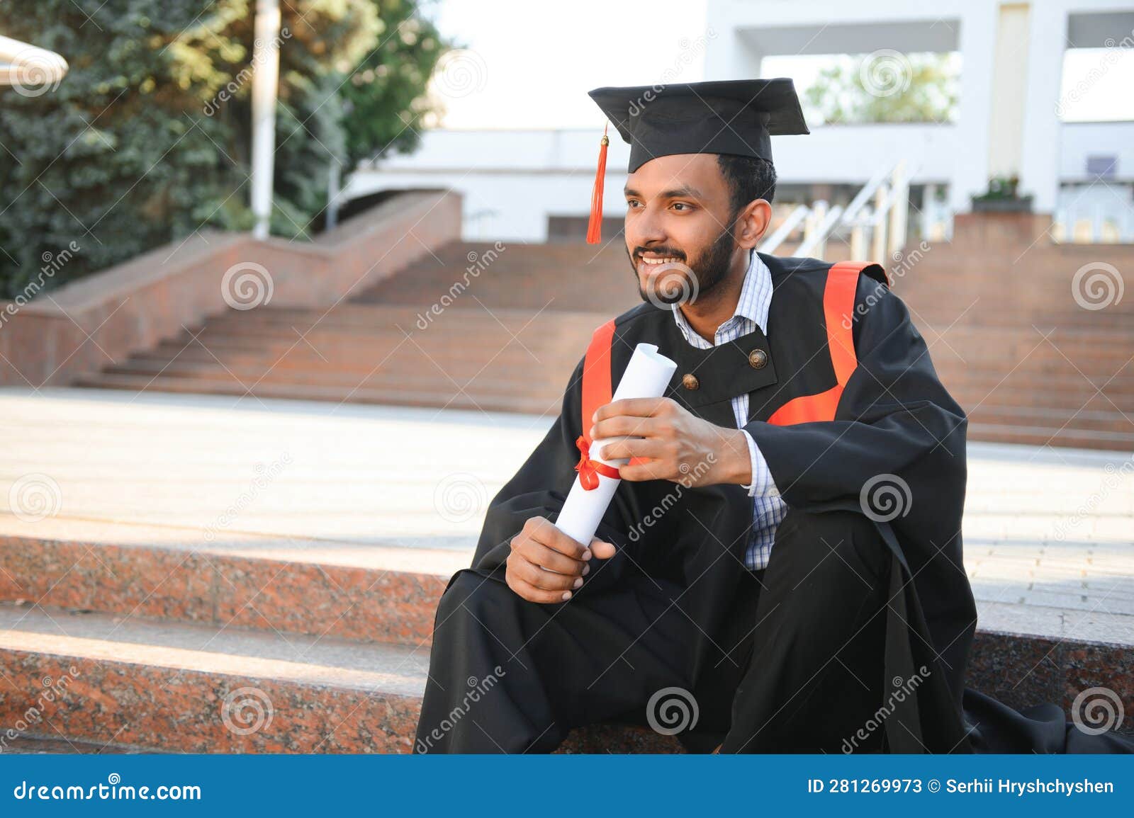 Handsome Indian Graduate in Graduation Glow with Diploma. Stock Image ...