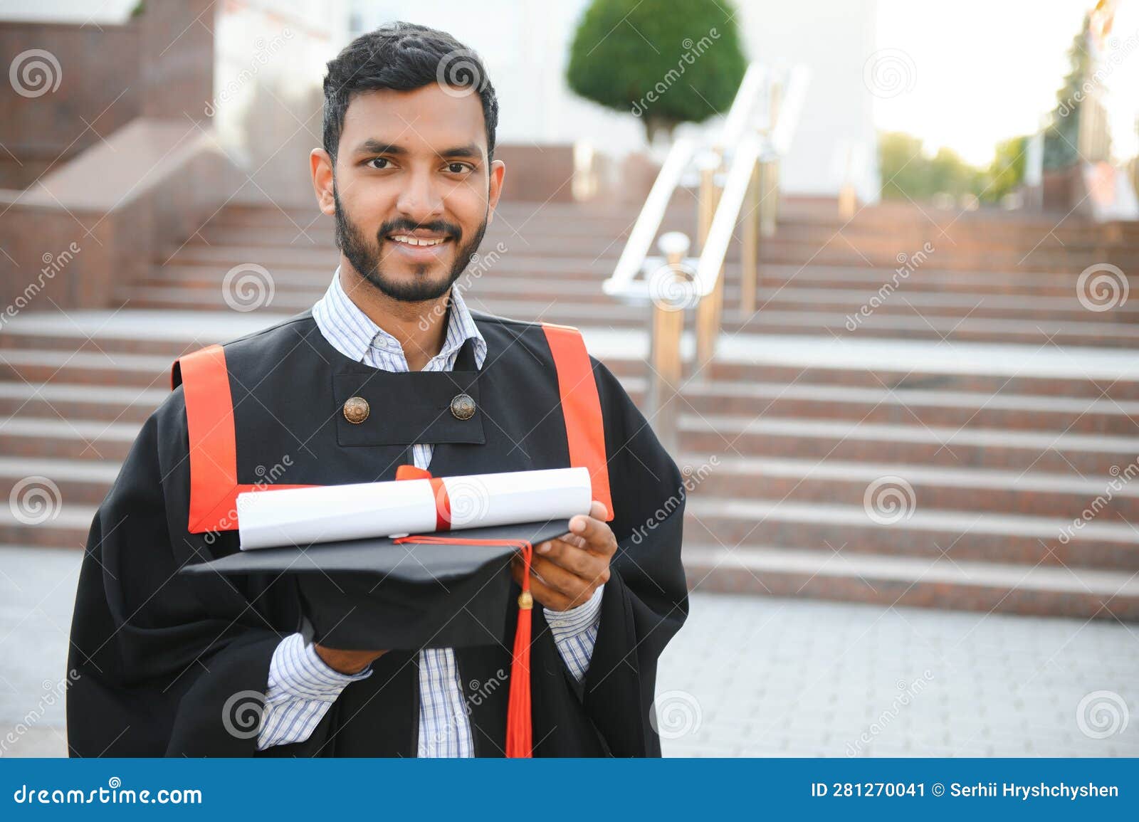 Handsome Indian Graduate in Graduation Glow with Diploma. Stock Image ...