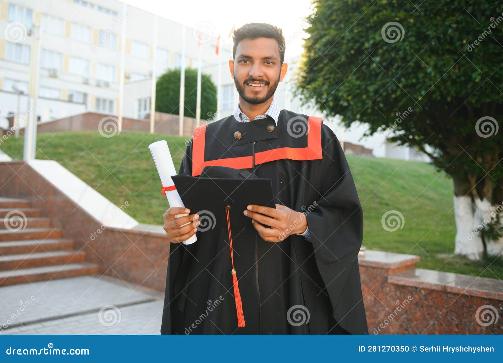 Handsome Indian Graduate in Graduation Glow with Diploma. Stock Photo ...