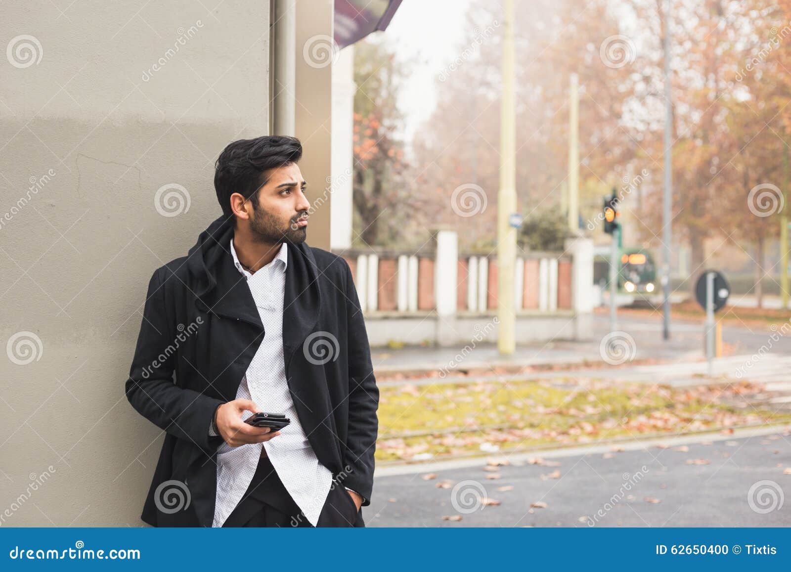 Handsome Indian Man Texting in an Urban Context Stock Photo - Image of ...