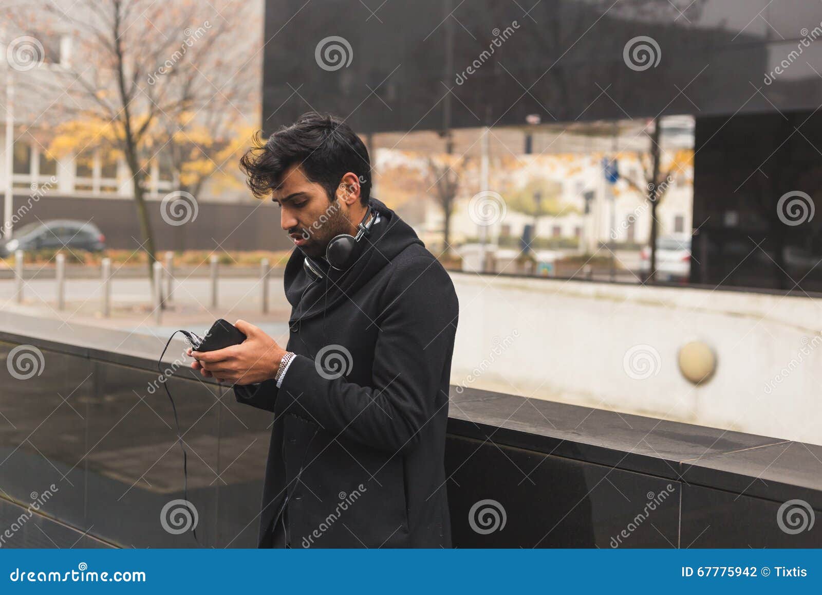 Handsome Indian Man Texting in an Urban Context Stock Photo - Image of ...