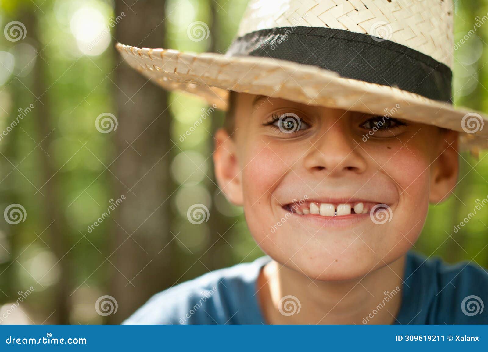 Handsome Kid with Straw Hat Stock Image - Image of face, straw: 309619211