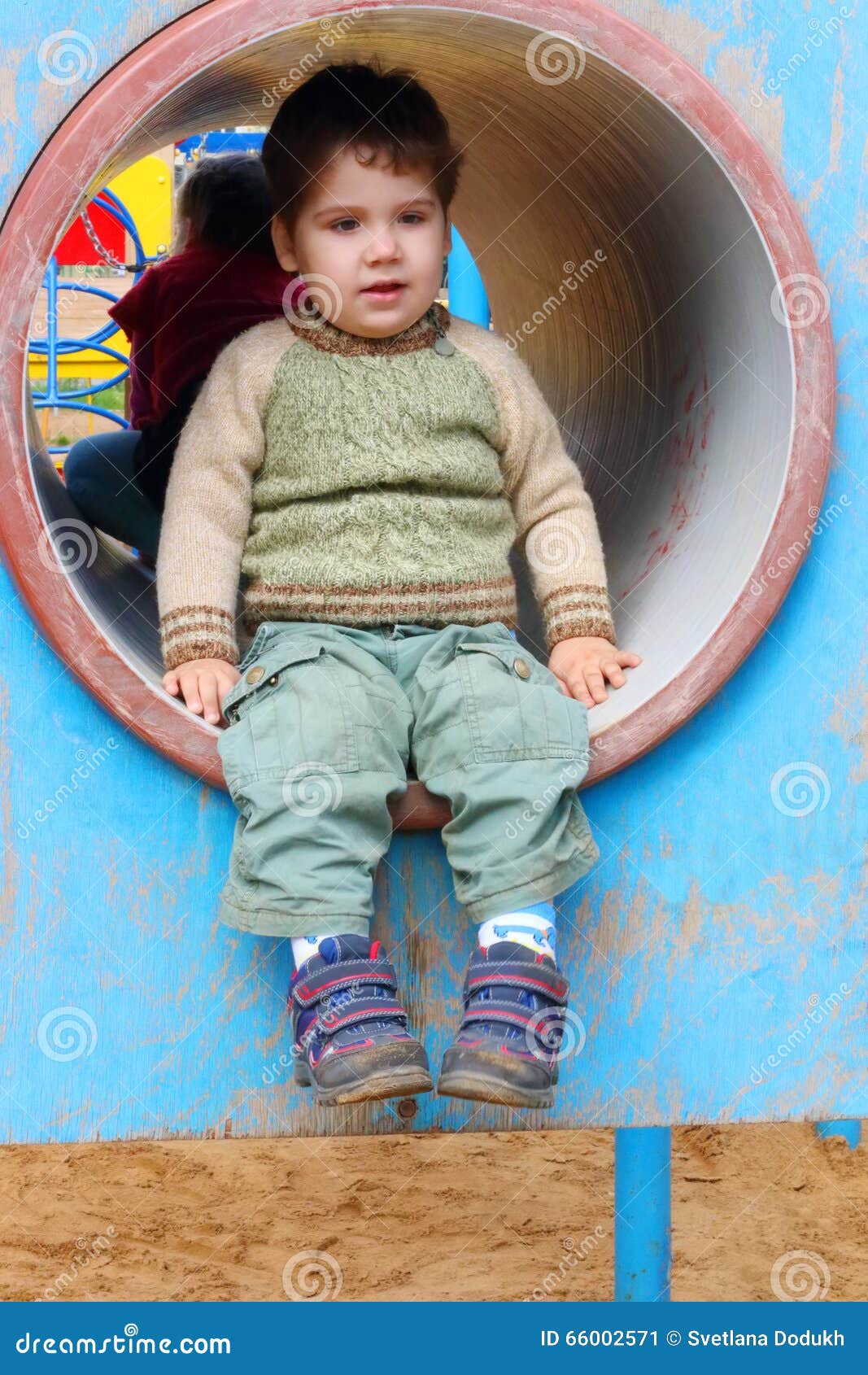 Handsome Little Boy Sits in Pipe on Playground Stock Image - Image of ...