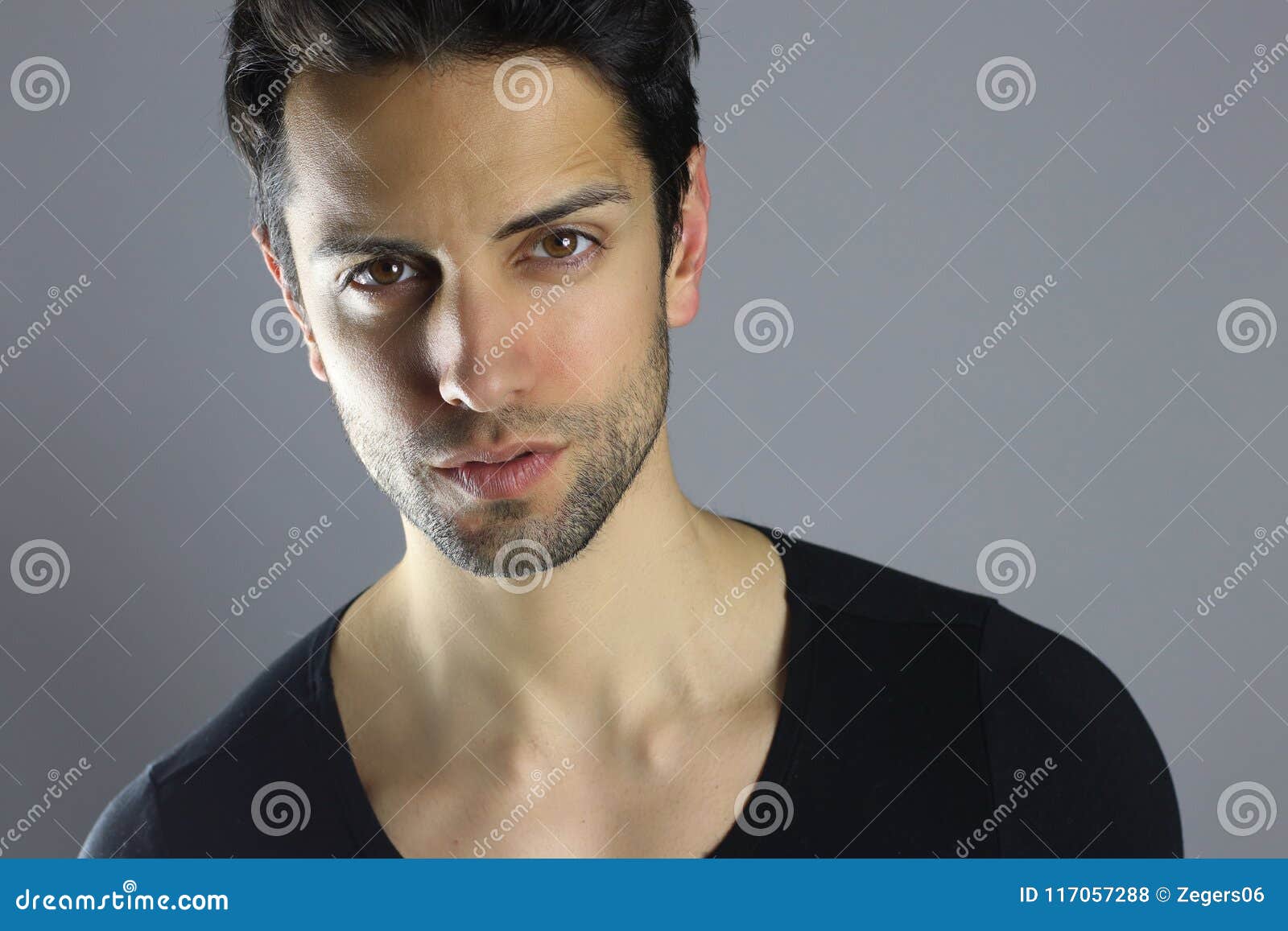 Handsome macho man posing stock photo. Image of male - 117057288