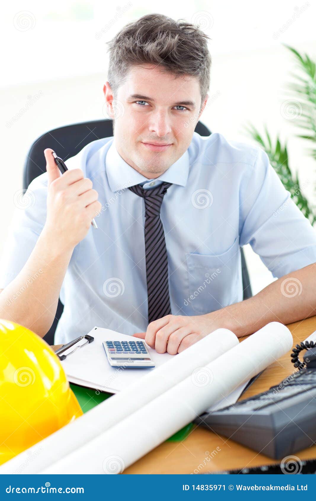 Handsome Male Architect Studying a Project Stock Image - Image of ...