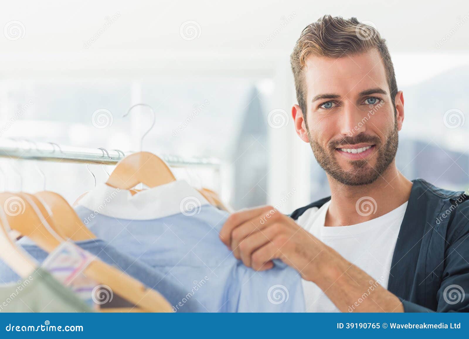 Handsome Male Customer by Clothes Rack Stock Image - Image of male ...