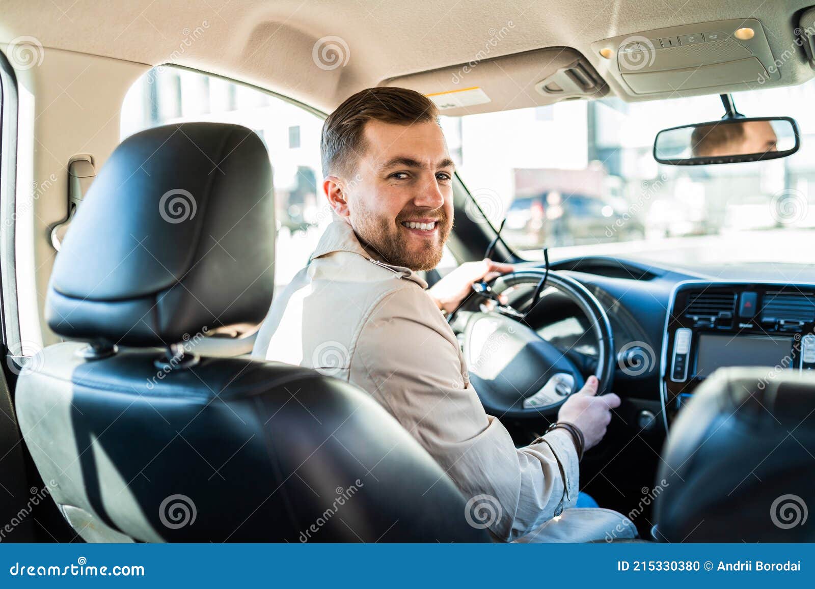 Handsome Male Driver Looking Back. Stock Photo - Image of joyful, look ...