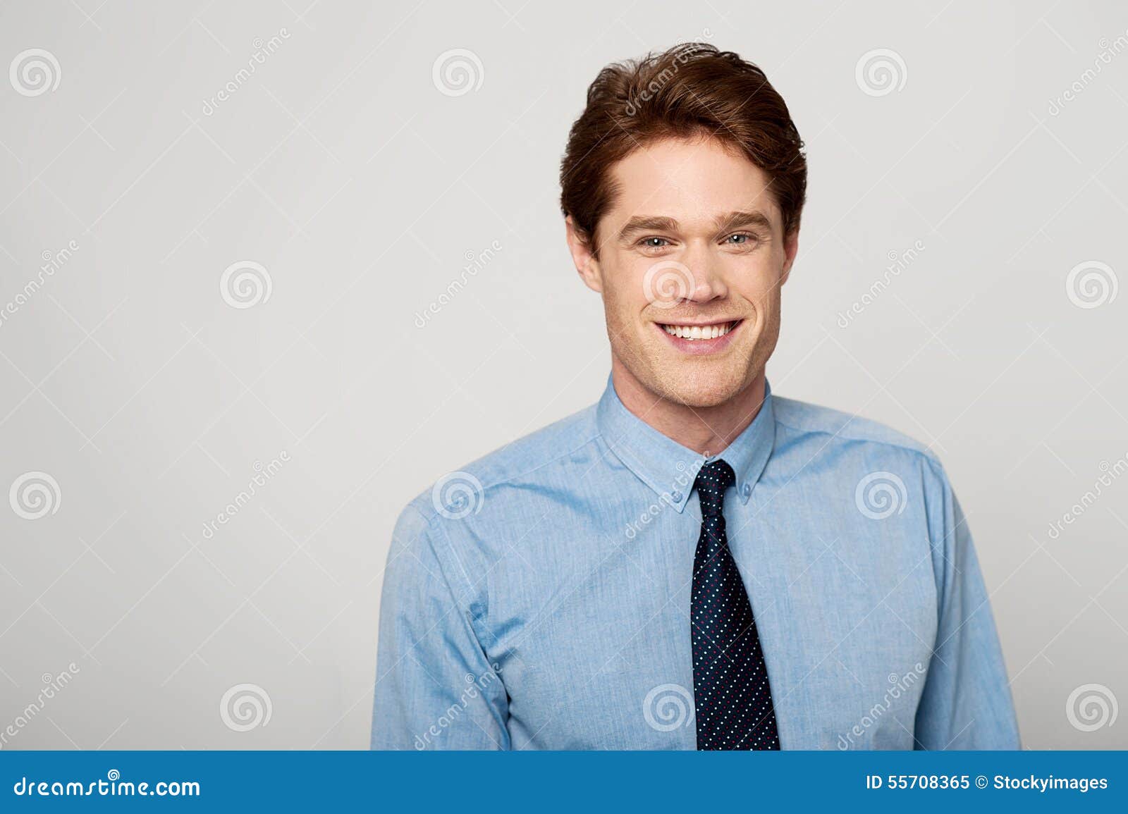 Handsome Male Executive Over Grey Stock Image - Image of young, smiling ...