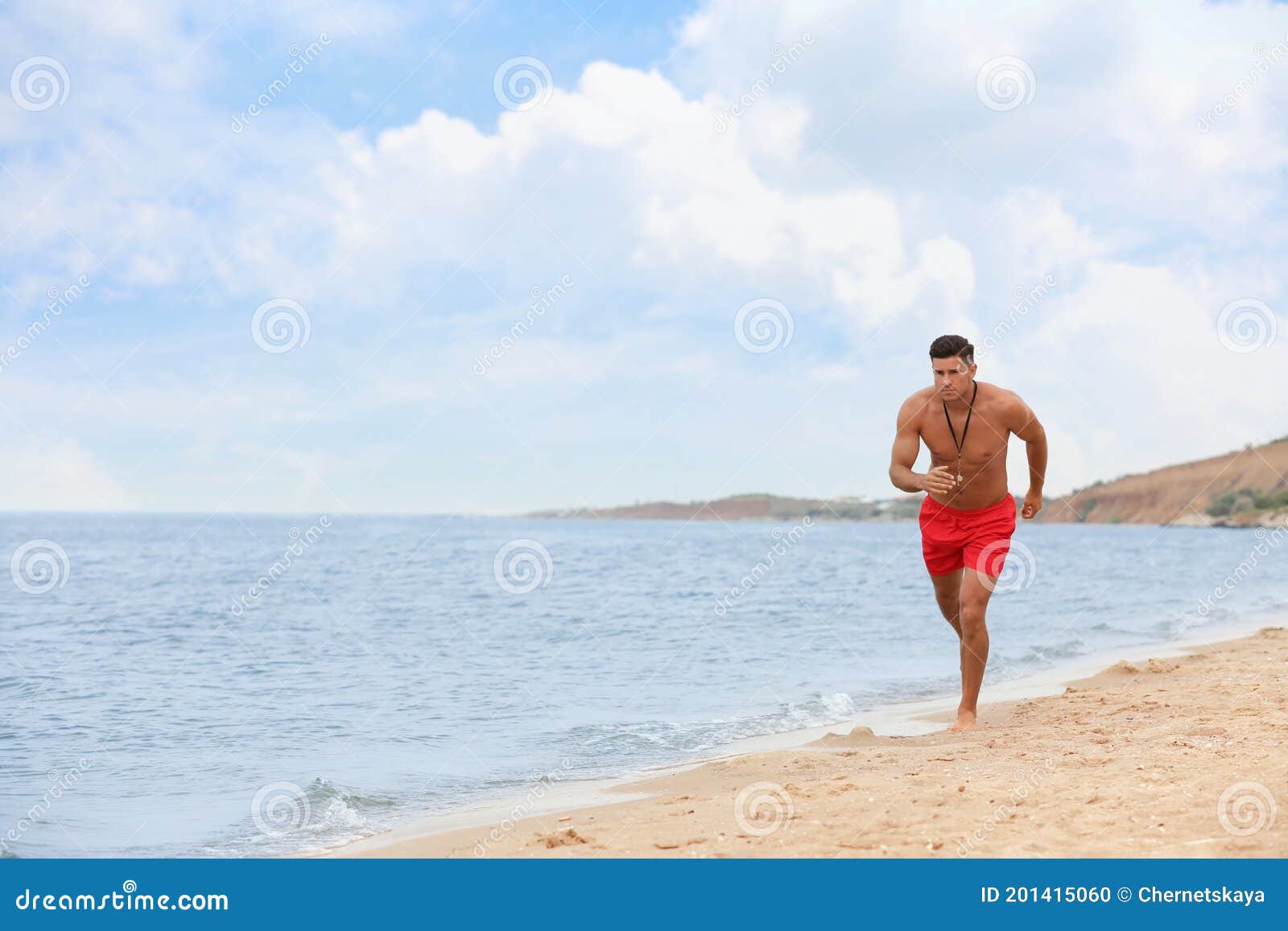 Handsome Male Lifeguard Running on Sandy Beach Stock Photo - Image of ...