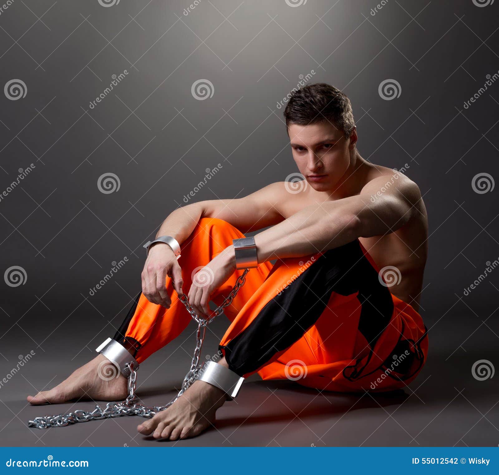 Handsome Male Model Posing As Prisoner in Studio Stock Photo - Image of ...