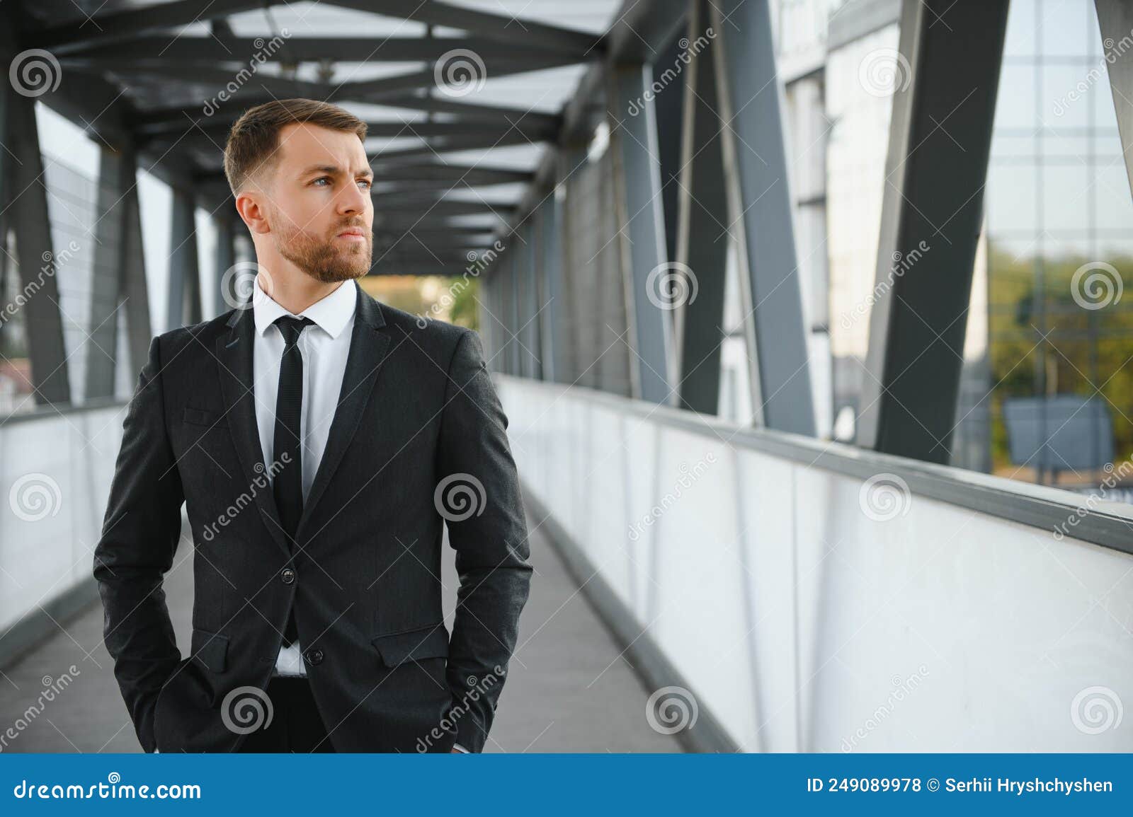 Handsome Male Model Posing Wearing a Back Suit. Stock Photo - Image of ...