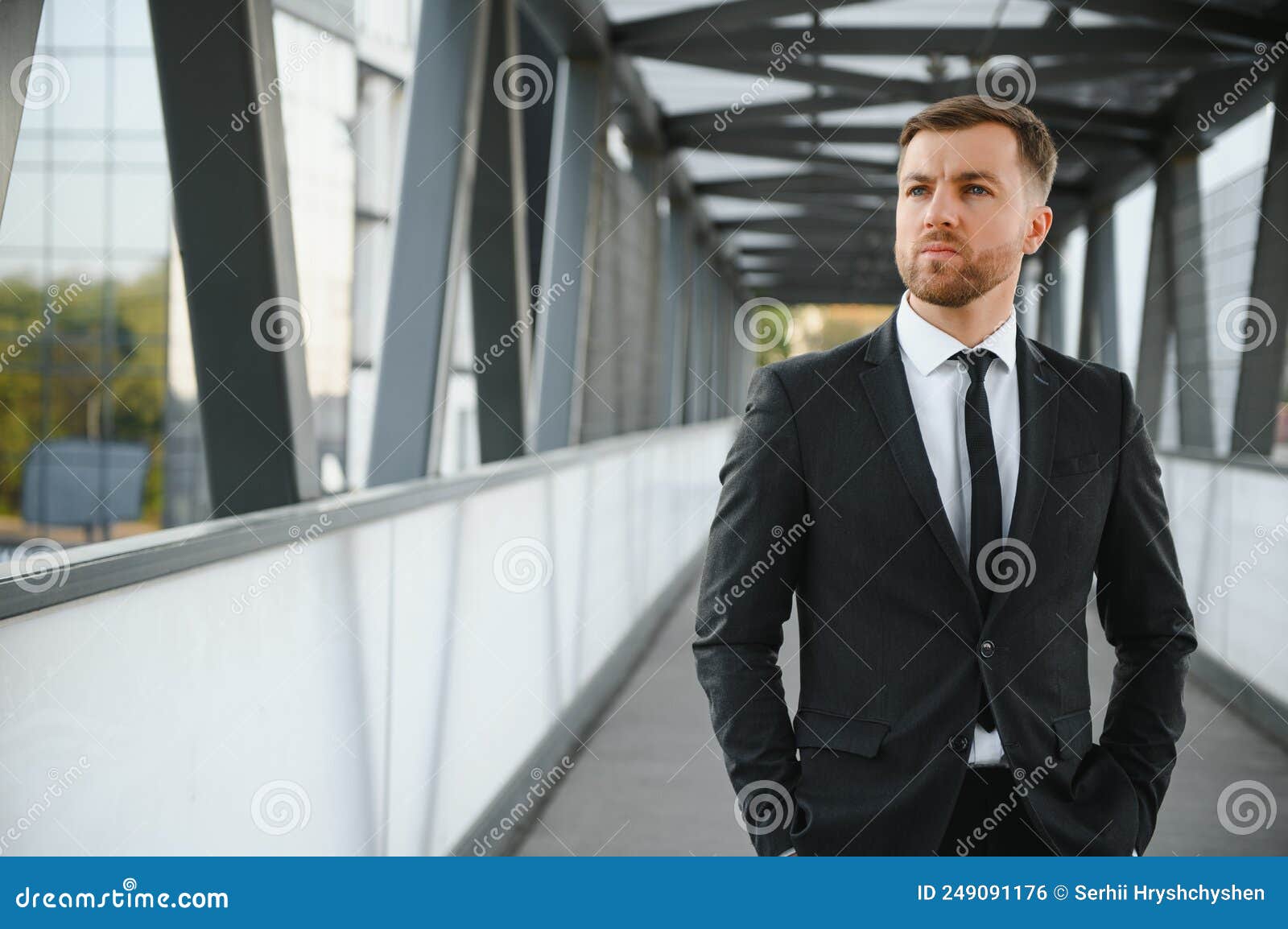 Handsome Male Model Posing Wearing a Back Suit. Stock Photo - Image of ...