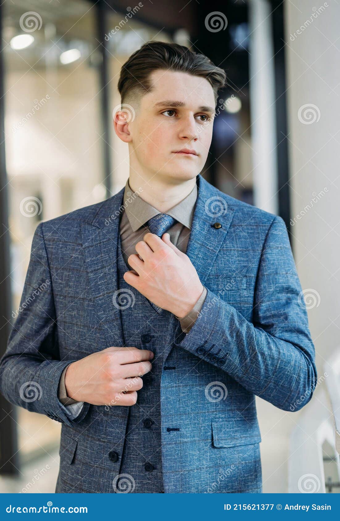 Handsome Male Model Posing Wearing a Blue Suit. Stock Image - Image of ...