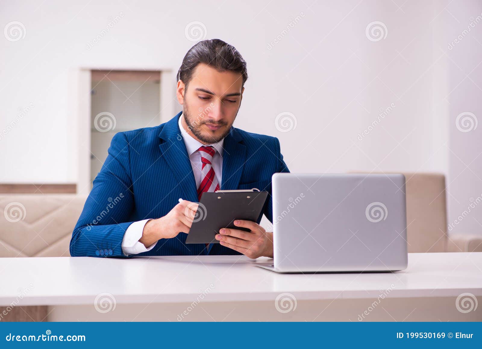 Handsome Male Realtor Working Indoors Stock Image - Image of appraiser ...