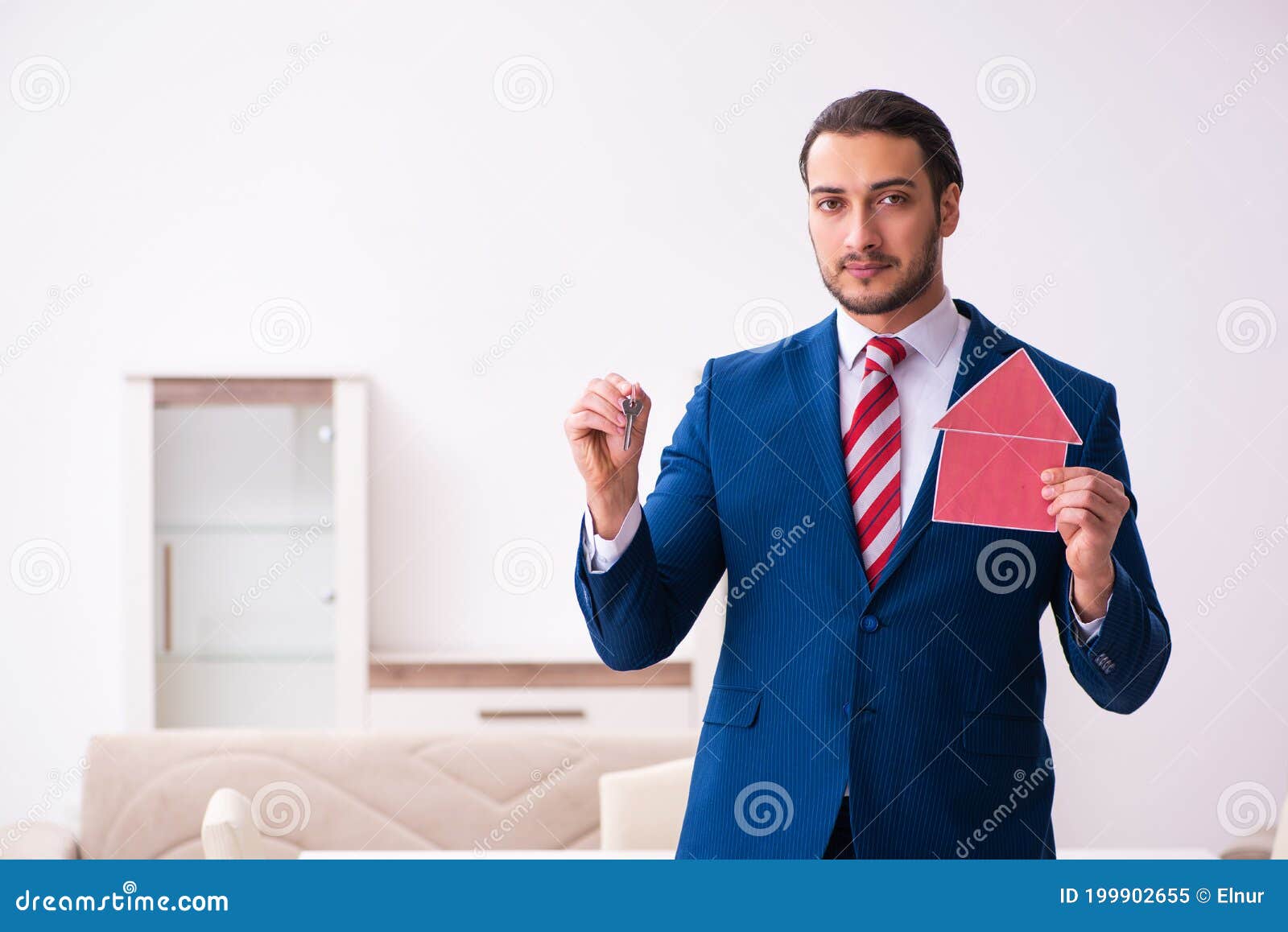 Handsome Male Realtor Working Indoors Stock Image - Image of house ...
