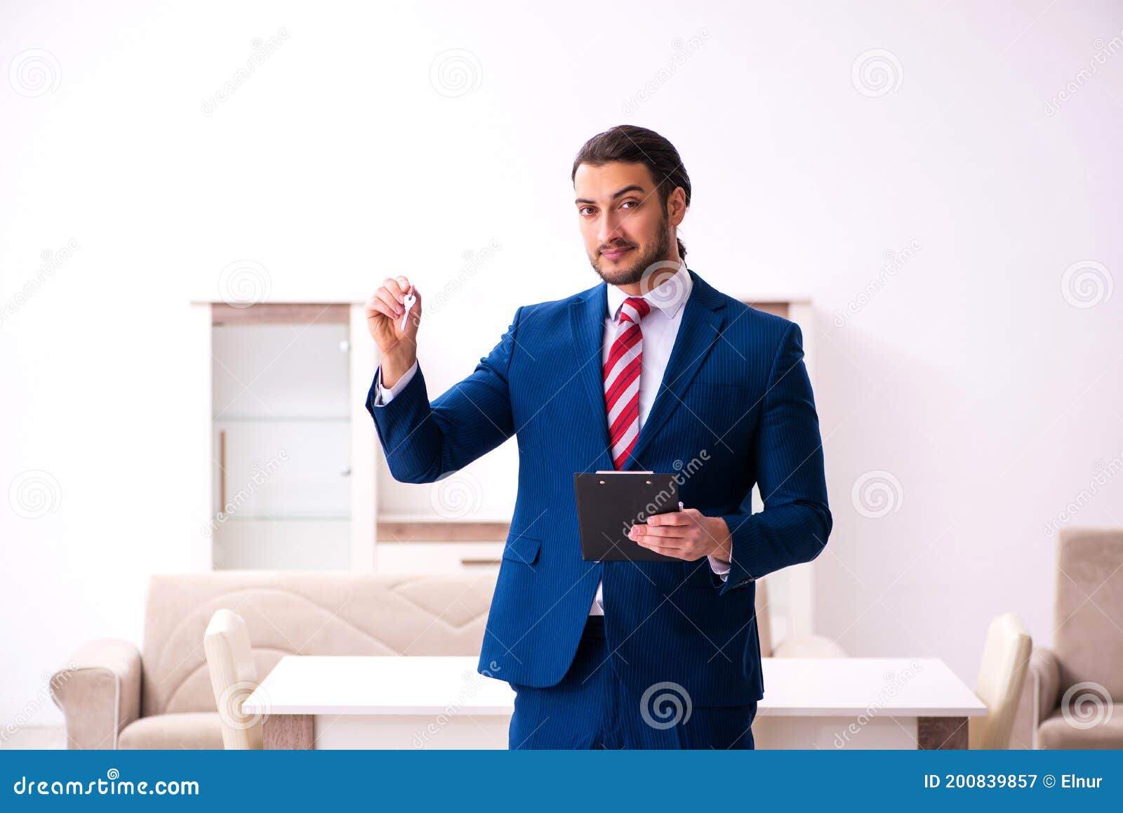 Handsome Male Realtor Working Indoors Stock Image - Image of consultant ...