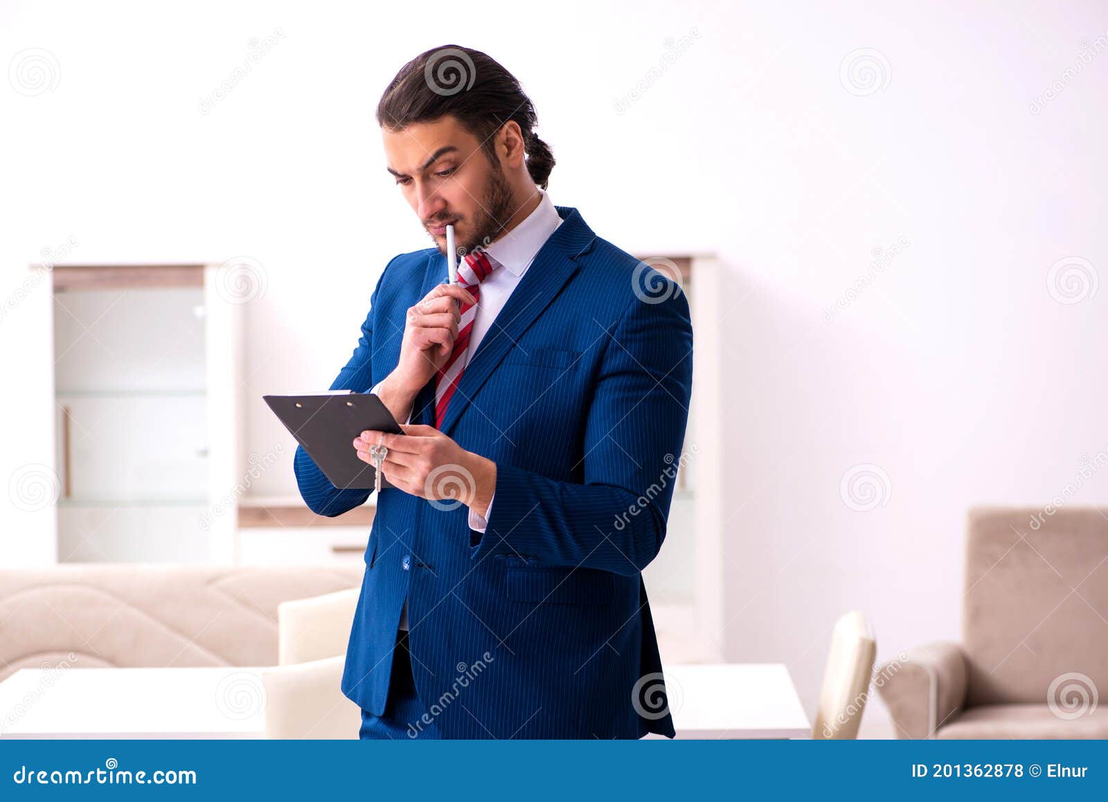 Handsome Male Realtor Working Indoors Stock Photo - Image of mortgage ...