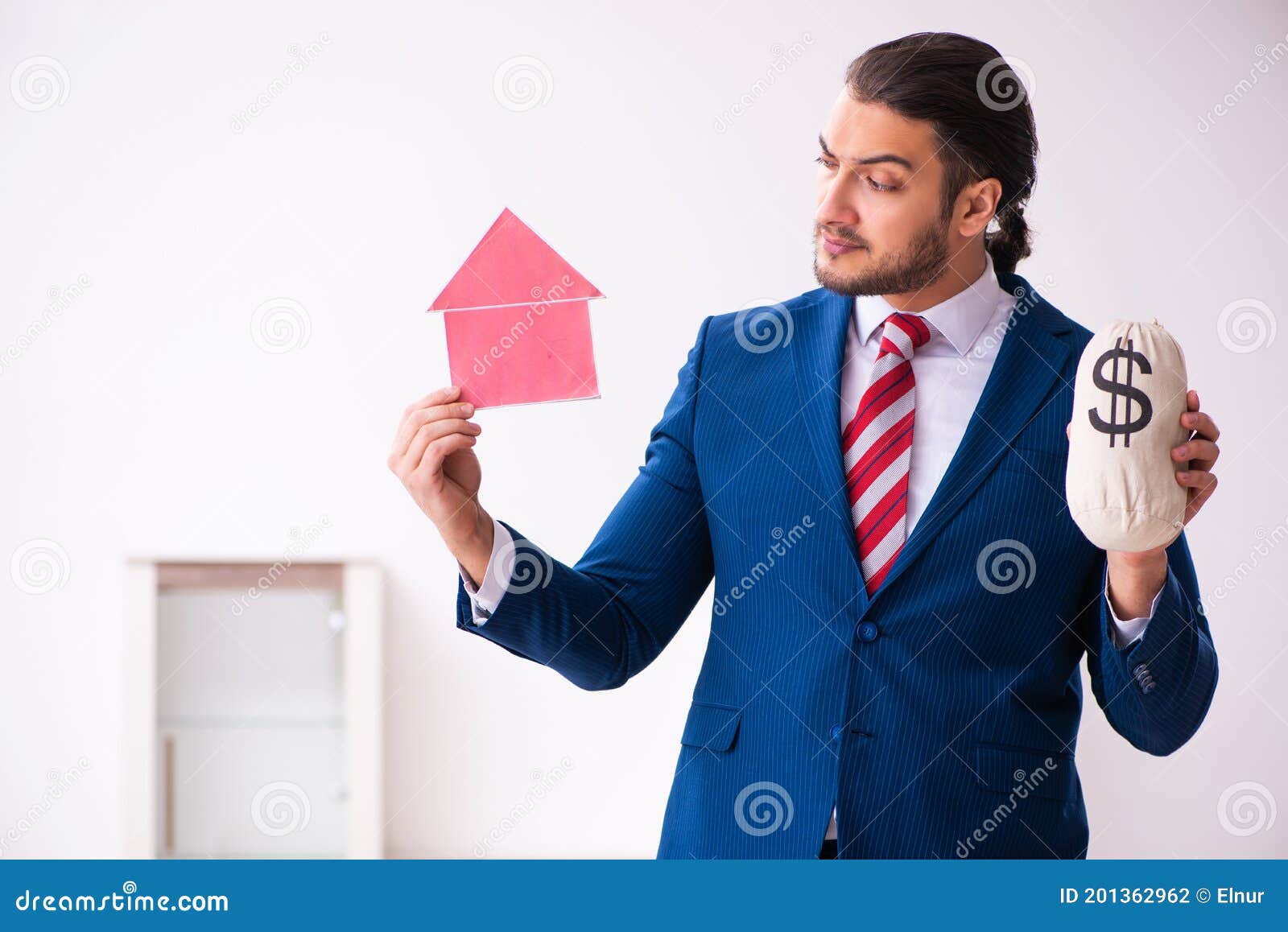 Handsome Male Realtor Working Indoors Stock Photo - Image of investing ...