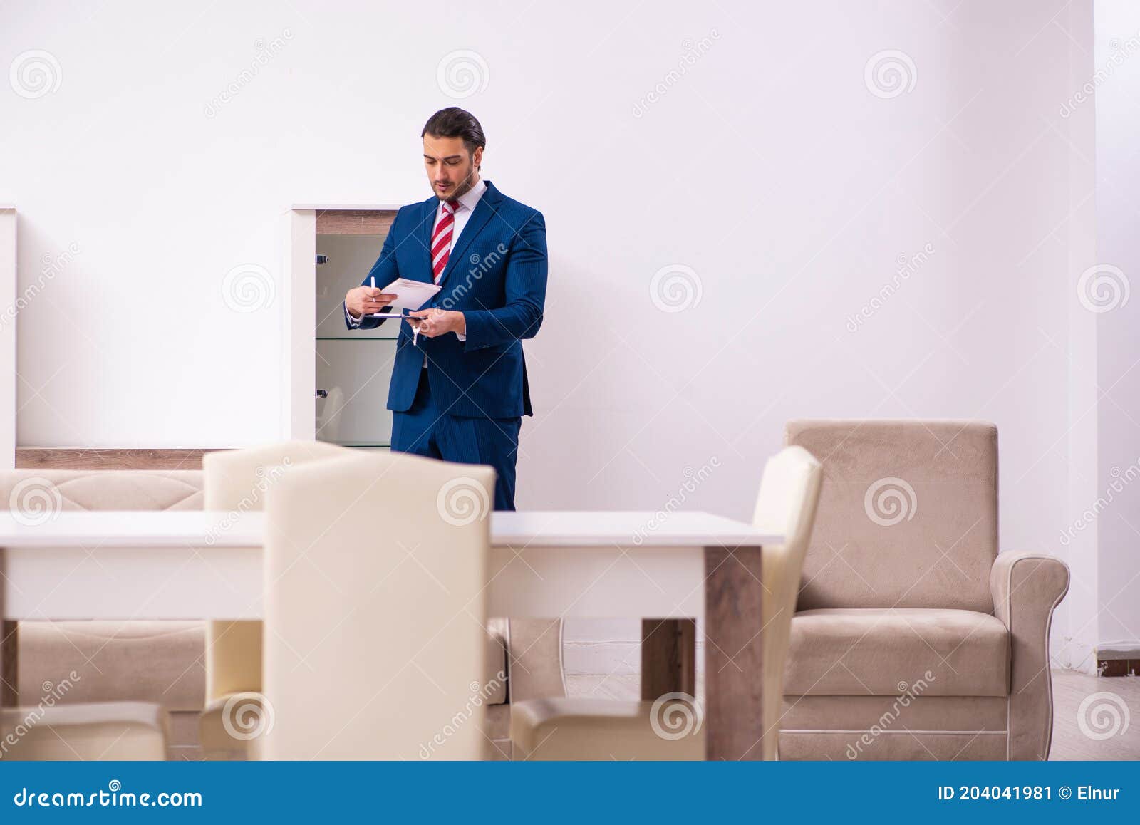 Handsome Male Realtor Working Indoors Stock Image - Image of estate ...