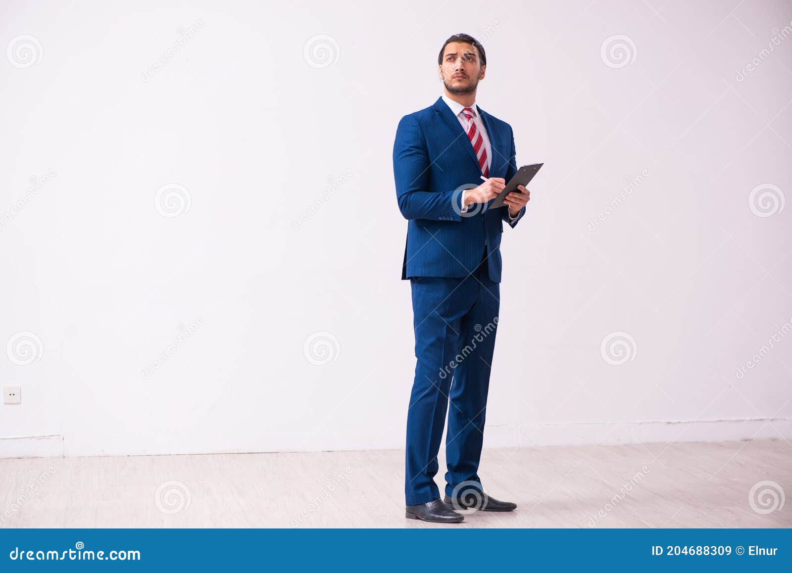 Handsome Male Realtor Working Indoors Stock Image - Image of appraisal ...