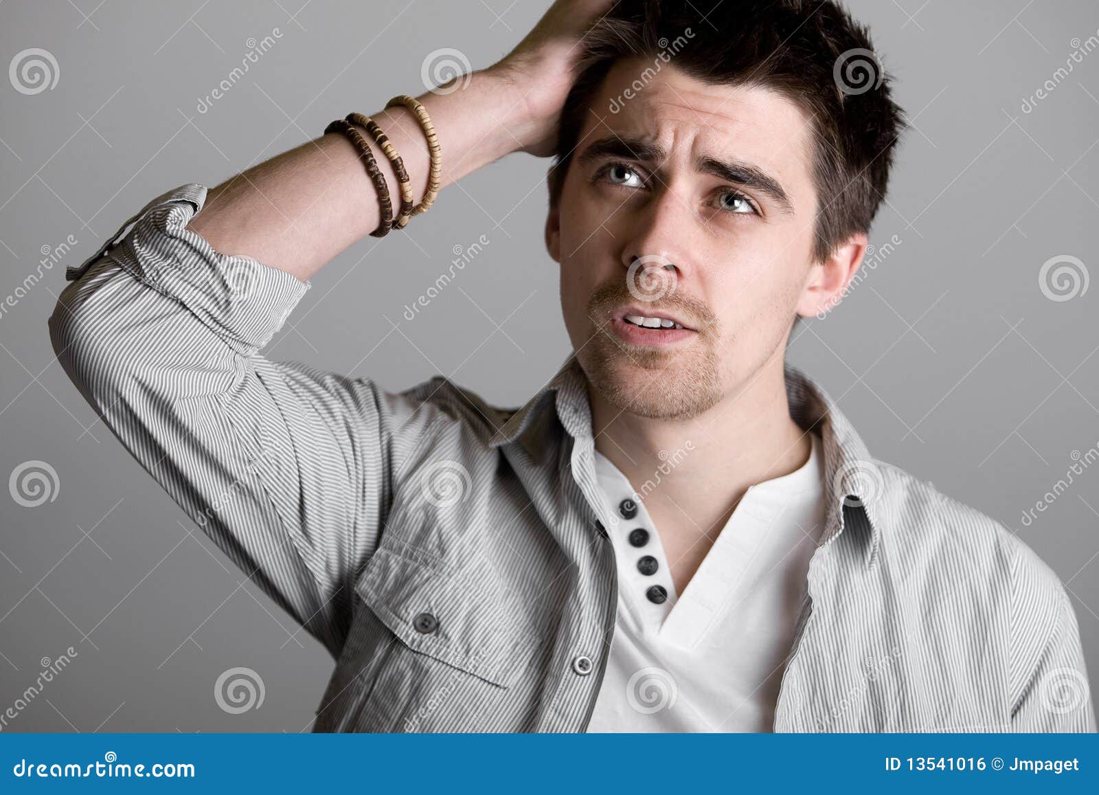 Handsome Male Scratching His Head Stock Photo - Image of portrait ...